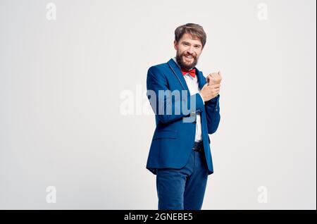 emotional man wearing bow tie suit posing isolated background Stock ...