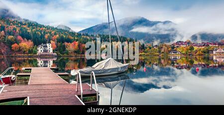 Picturesque autumn panorama of Brauhof village. Amazing morning scene ...
