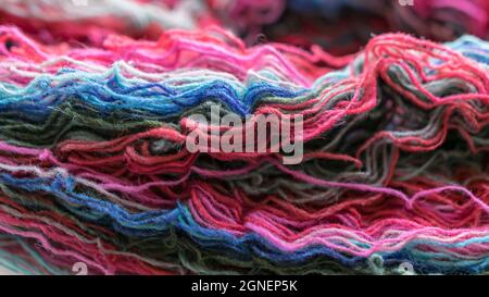 photography with colorful, variegated, bright wool yarn fragments ...