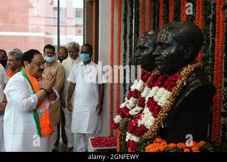 Indian Ruling Party President J.P. Nadda paying homage by putting ...