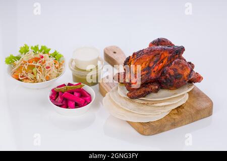 Shawai chicken with kuboose and dips Stock Photo - Alamy