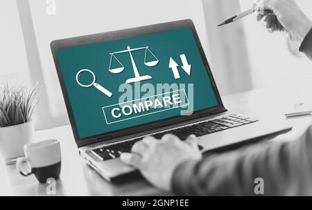 Laptop screen displaying a compare concept Stock Photo - Alamy