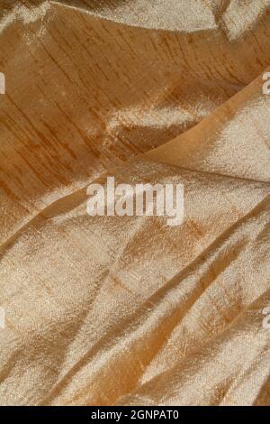 A Golden Copper Fabric Shiny Background Stock Photo - Alamy