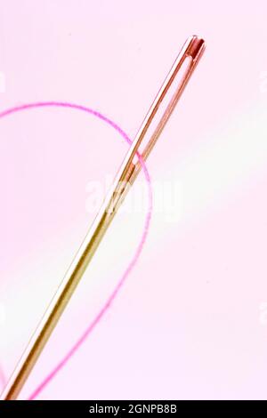 twine with needle Stock Photo - Alamy