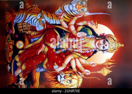 Shiva hindu temple. Picture of Hindu goddess Durga with lion and tigers ...