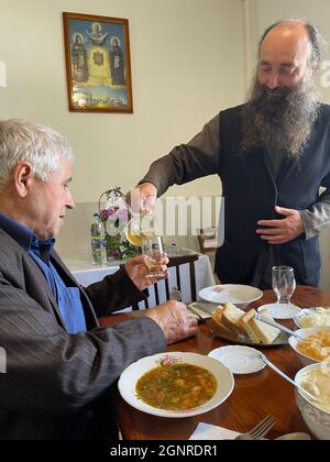 Rudi orthodox monastery, Moldova. Abbot breaking Easter eggs with a ...
