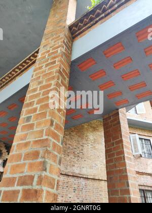 Exterior brick walls construction with a slab, hidden or concealed beam ...