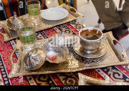 Turkish coffee and traditional turkish delight served on silver set ...