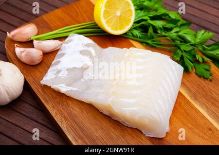 Raw pink cusk-eel fish fillet, seafood ingredients Stock Photo - Alamy