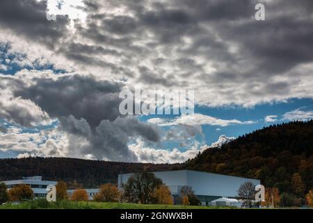 Factory in the middle of the colorful countryside Stock Photo - Alamy