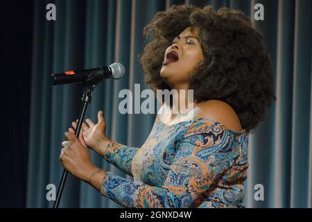 South African singer Buhle Mad performs as part of the acapella group ...