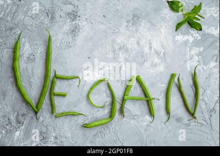 Vegetable Vegan word on grunge abstract background Stock Photo - Alamy