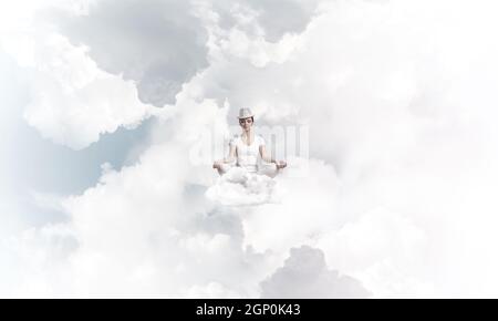Young woman keeping mind conscious Stock Photo - Alamy