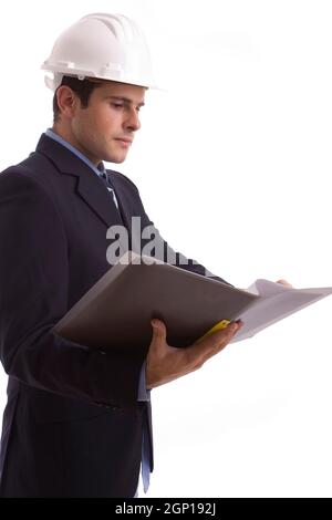 Young Engineer, reading a plan, isolated on white Stock Photo - Alamy