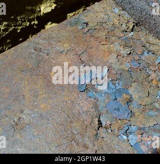 Flakes of rust on a sheet of rusty iron. Background of rust. Corrosion ...