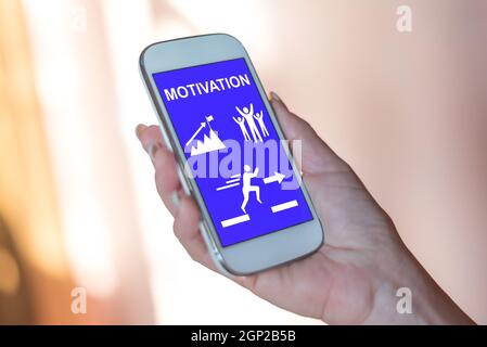 Smartphone screen displaying a motivation concept Stock Photo - Alamy