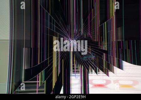 Close up photo of a smashed laptop screen, MacBook Pro Retina, with a ...