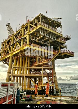 Petronas oil rig is in operation Stock Photo - Alamy