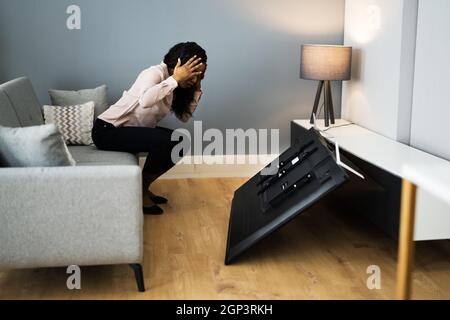Broken Fallen TV On Television Damage Accident Stock Photo - Alamy