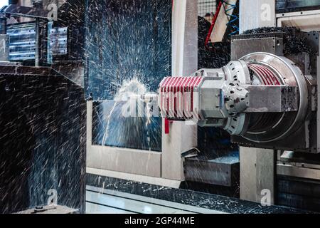 Industrial milling machine robot working on workpiece Stock Photo - Alamy