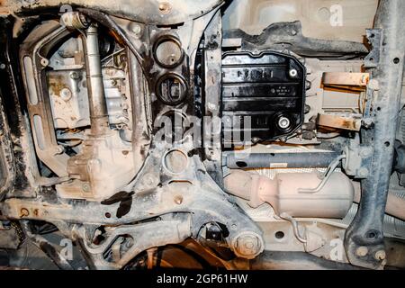 View of the car from below. Autoservice center. Car maintenance Stock ...