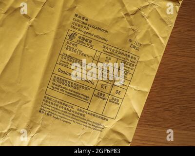 Chinese customs declaration and postage meter on a foreign parcel from ...