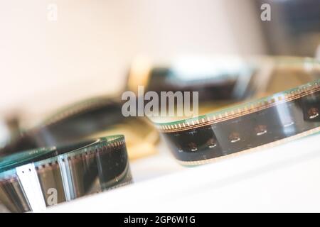 Filmstrip or film reel on a cutting table, vintage film production in ...