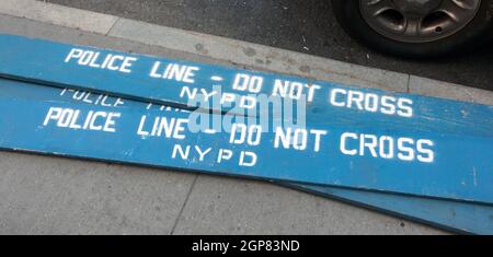 Police barrier Police Department Do Not Cross barricade. Crowd at ...