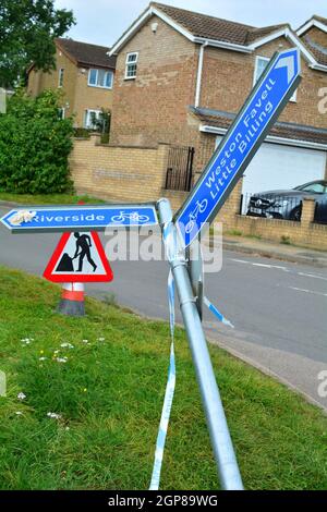 Street signs damaged in RTC car crash England Uk Stock Photo - Alamy