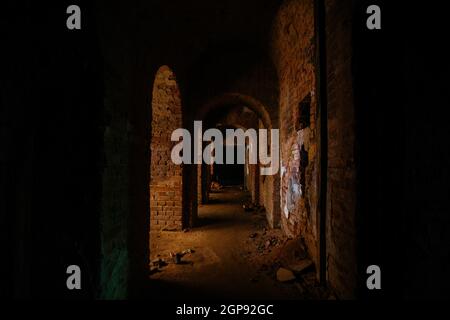 Vaulted red brick dungeon under old castle Stock Photo - Alamy