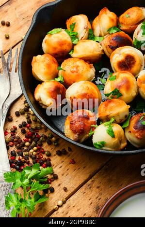 Frying pan with roasted tasty pelmeni.Fried dumplings Stock Photo - Alamy