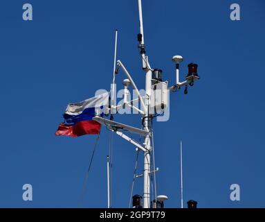 Mast of the port service ship. Devices of light signaling and ...