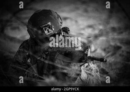 A Marine with the Advanced Machine Gunner Course, Advanced Infantry ...