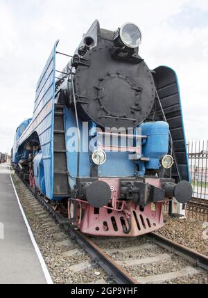 The blue express steam locomotive which is accelerating momentum 125 km ...