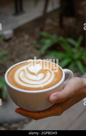 Handcraft of hot milk coffee cup, stock photo Stock Photo - Alamy