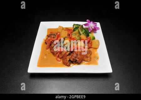 Traditional and delicious Thai dish known as duck curry Stock Photo - Alamy