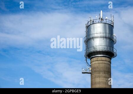 Antennas installed on top of water tower Stock Photo - Alamy