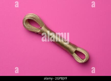 twisted clothesline on pink background, top view Stock Photo - Alamy