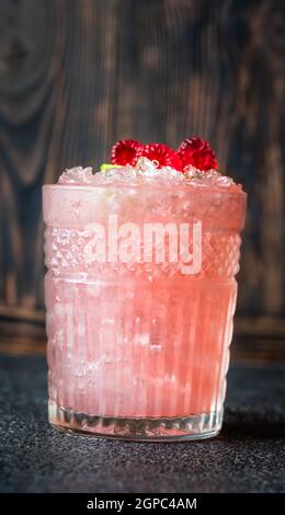 Glass of Knickerbocker cocktail made of rum, lime juice, orange curacao ...