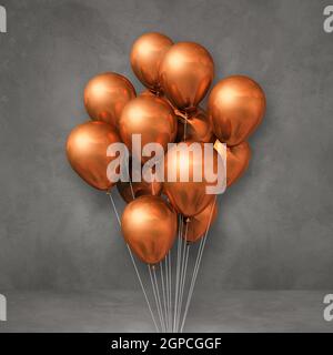 Copper balloons bunch on a grey wall background. 3D illustration render ...