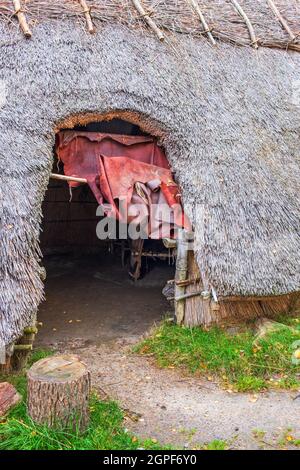 Stone Age hut of reeds in the woods Stock Photo - Alamy