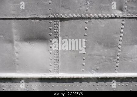 Old riveted ship hull plates Stock Photo - Alamy