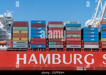 Containers, cargo bay, container ship Stock Photo - Alamy