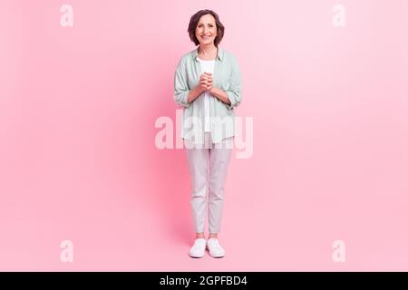 Photo of cheerful lady arms palms hold demonstrate empty space solution ...