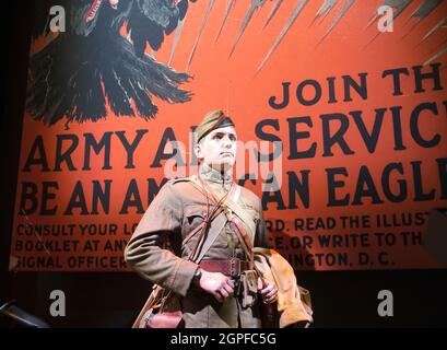Soldiers in front of WWI recruiting, propaganda posters. At the ...