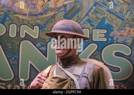 Soldiers in front of WWI recruiting, propaganda posters. At the ...