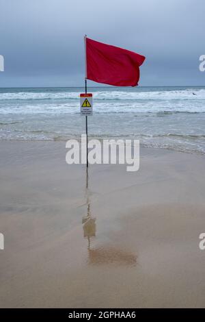 Red Swimming Warning flag of strong currents on Ventura Beach ...
