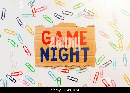 Conceptual caption Game Night. Word Written on event in which folks get ...