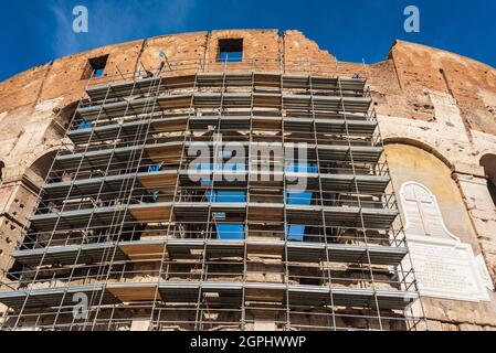 Construction scaffolding around the Colosseum, the iconic symbol of ...