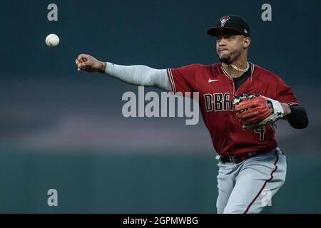 Arizona Diamondbacks' Ketel Marte, right, strikes out as Miami Marlins ...